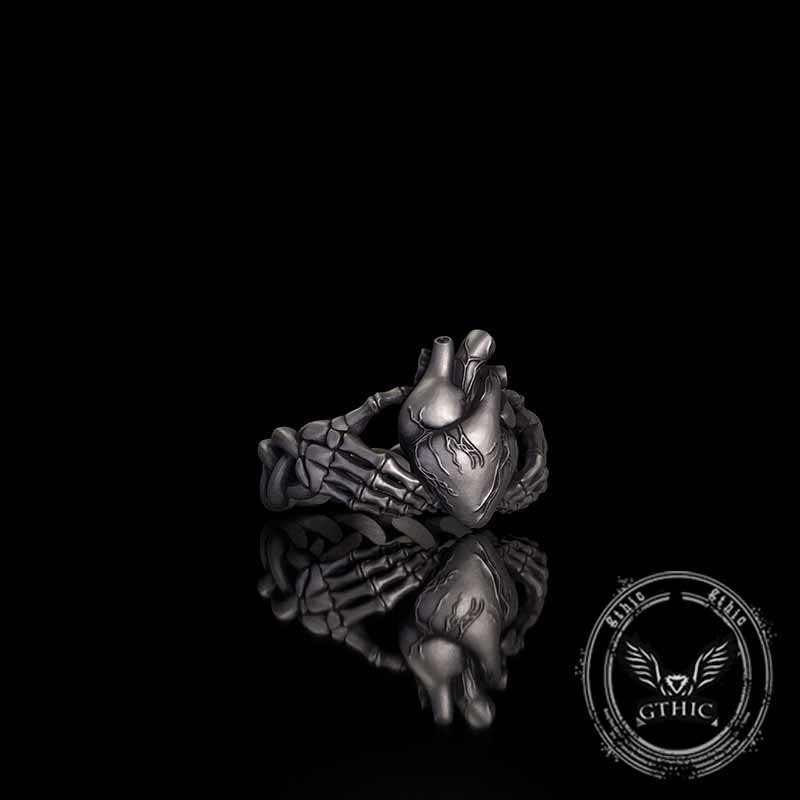Gothic Skull Hands Holding Heart Sterling Silver Ring – GTHIC